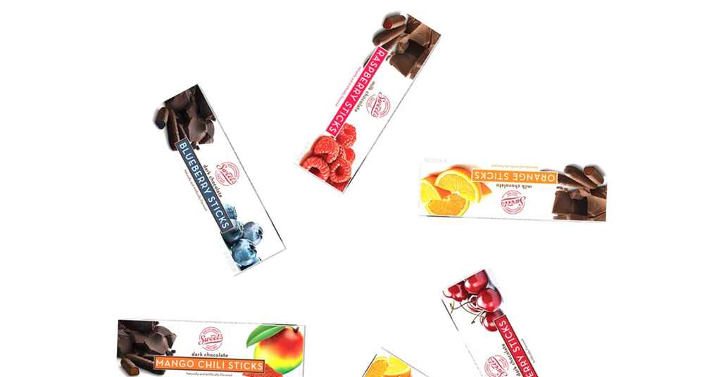 Schubert robot picks-and-places chocolate sticks into pre-erected trays ...