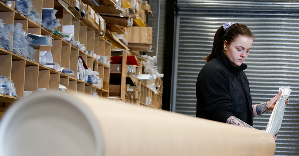 Emergency exit marking in lighter, recycled, and recyclable cardboard ...