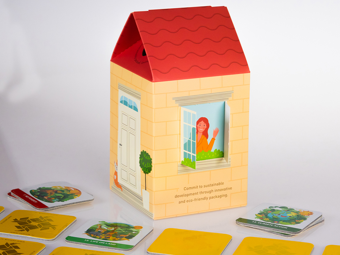 Sustainability-themed tile game for kids packaged in interactive box ...